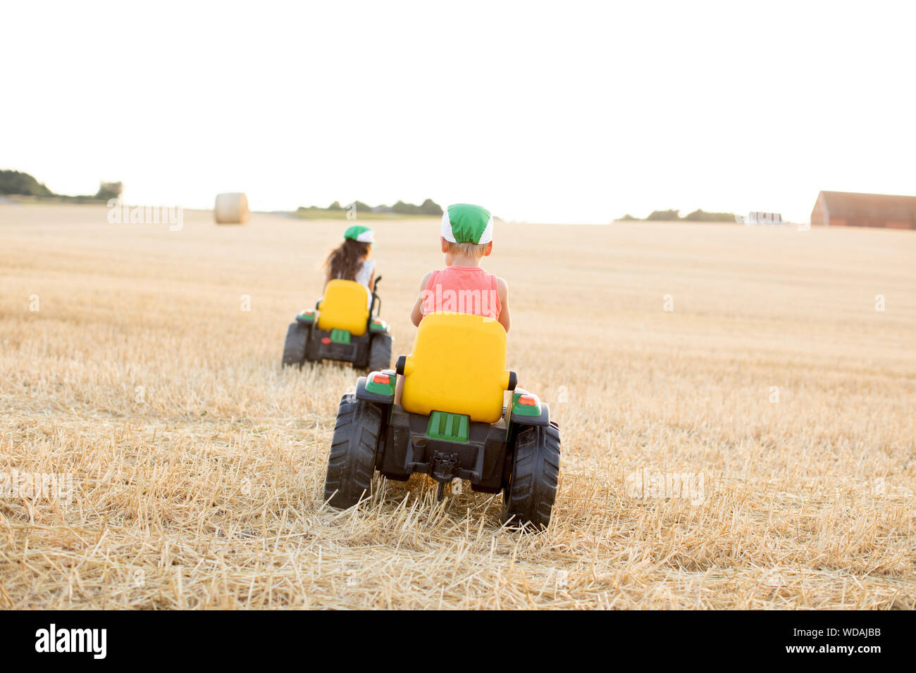 Field girls tractors hi-res stock photography and images - Alamy