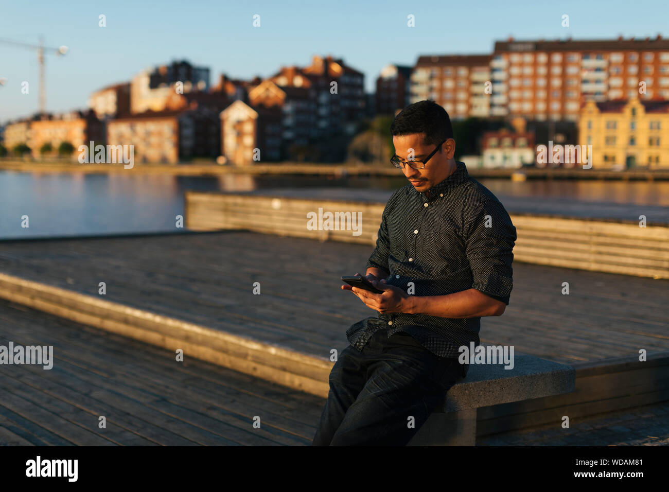 Sitting smart man hi-res stock photography and images - Alamy