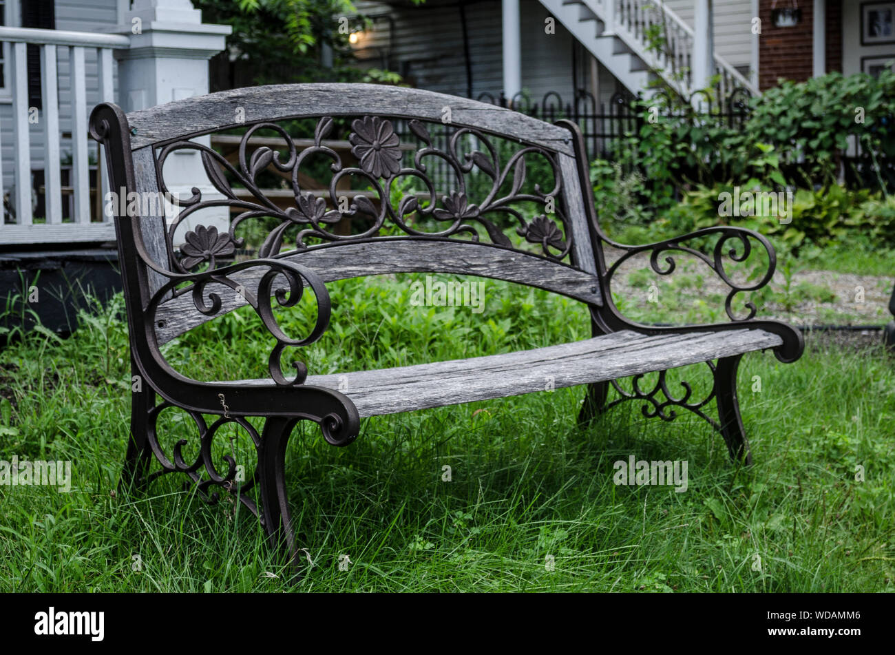 Empty bench at building hi-res stock photography and images - Alamy