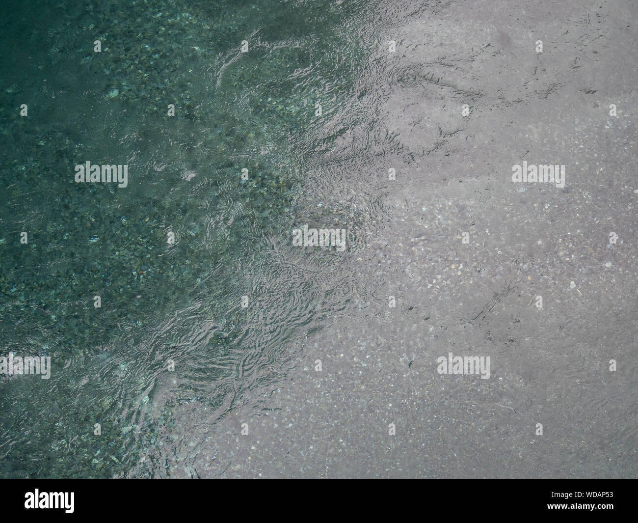 Blue Pools, New Zealand - clear cold turquoise water with raindrops ...
