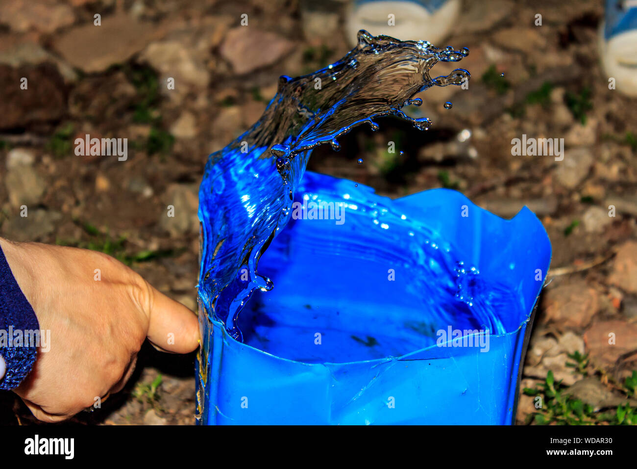 Water spilling hi-res stock photography and images - Alamy