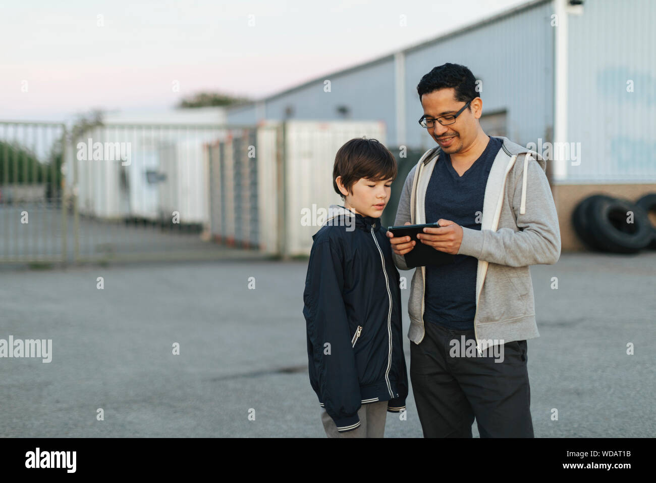 Parents using smart hi-res stock photography and images - Alamy