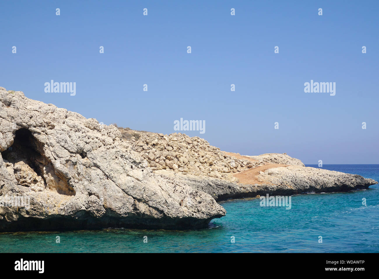 View sea small rock protruding hi-res stock photography and images - Alamy