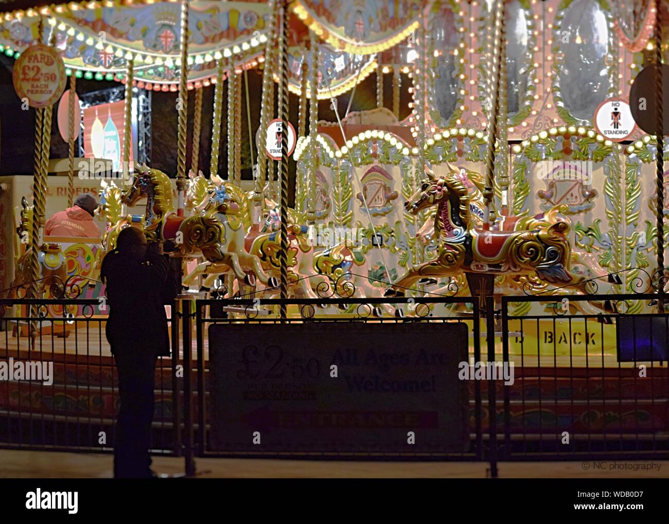 Man at carousel hi-res stock photography and images - Alamy
