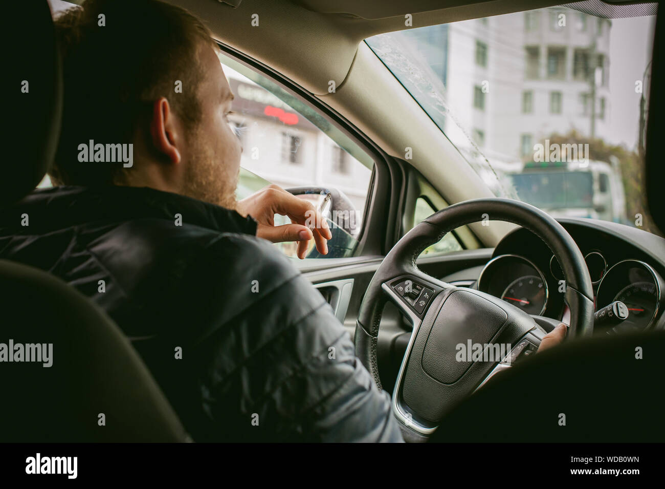 Adult smoking in car hi-res stock photography and images - Alamy