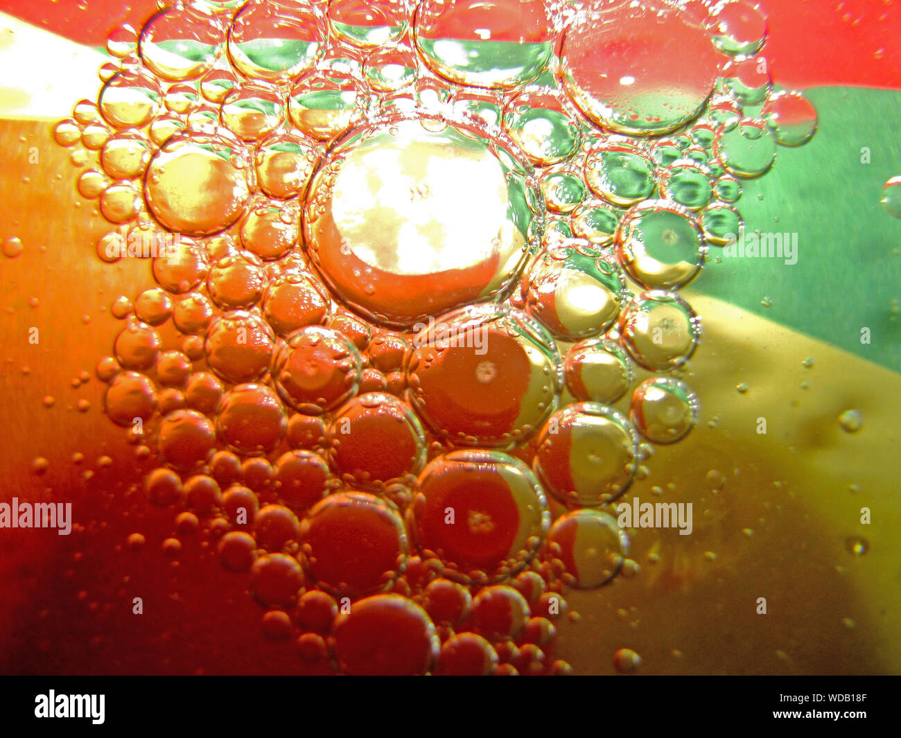 Oil floating in water hi-res stock photography and images - Alamy