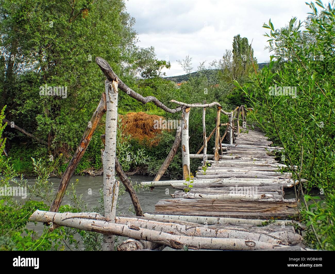 Wooden rustic footbridge hi-res stock photography and images - Alamy
