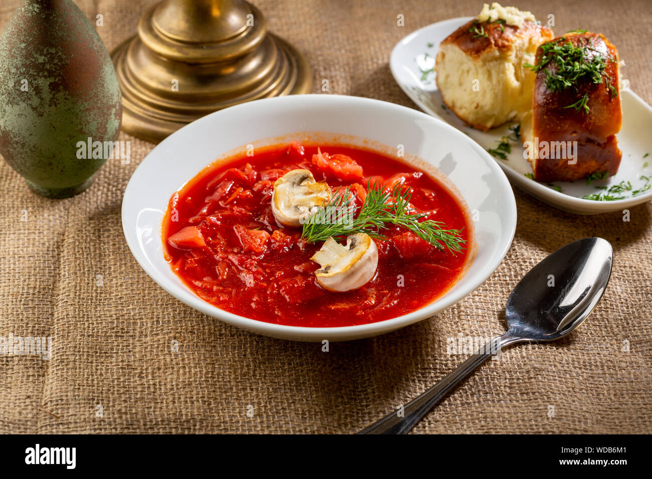 Red russian soup with mushrooms and bread Stock Photo - Alamy
