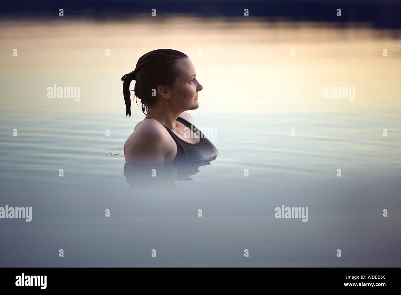 One woman water reflection hi-res stock photography and images - Alamy