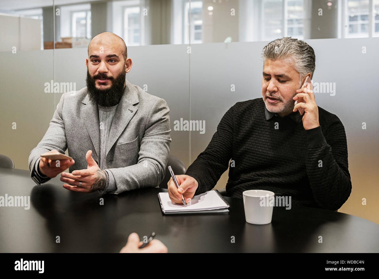 Boardroom meeting all men hi-res stock photography and images - Alamy