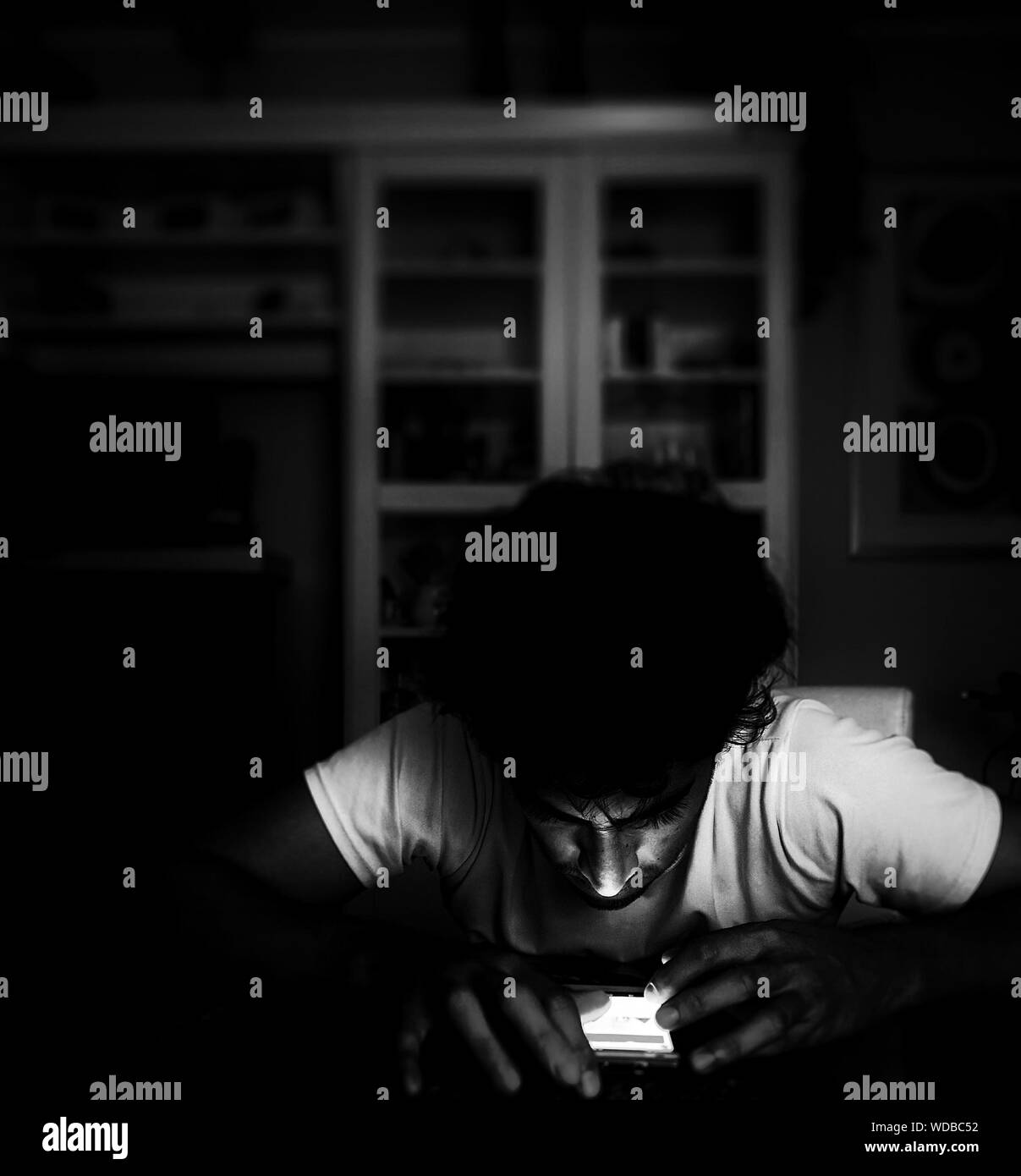 Dark room smart phone hi-res stock photography and images - Alamy