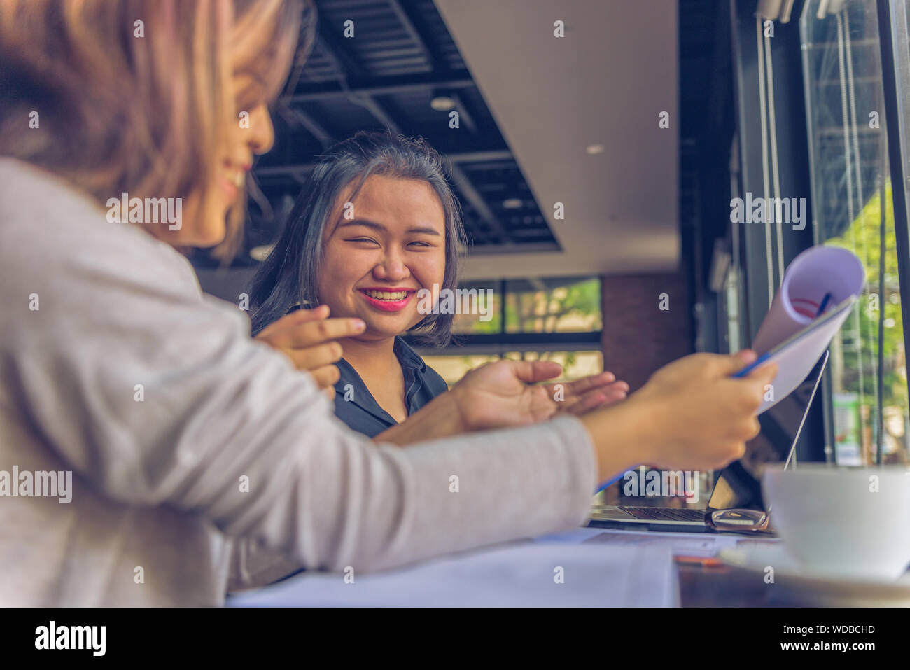 Happy woman have exciting conversation with her partner Stock Photo - Alamy