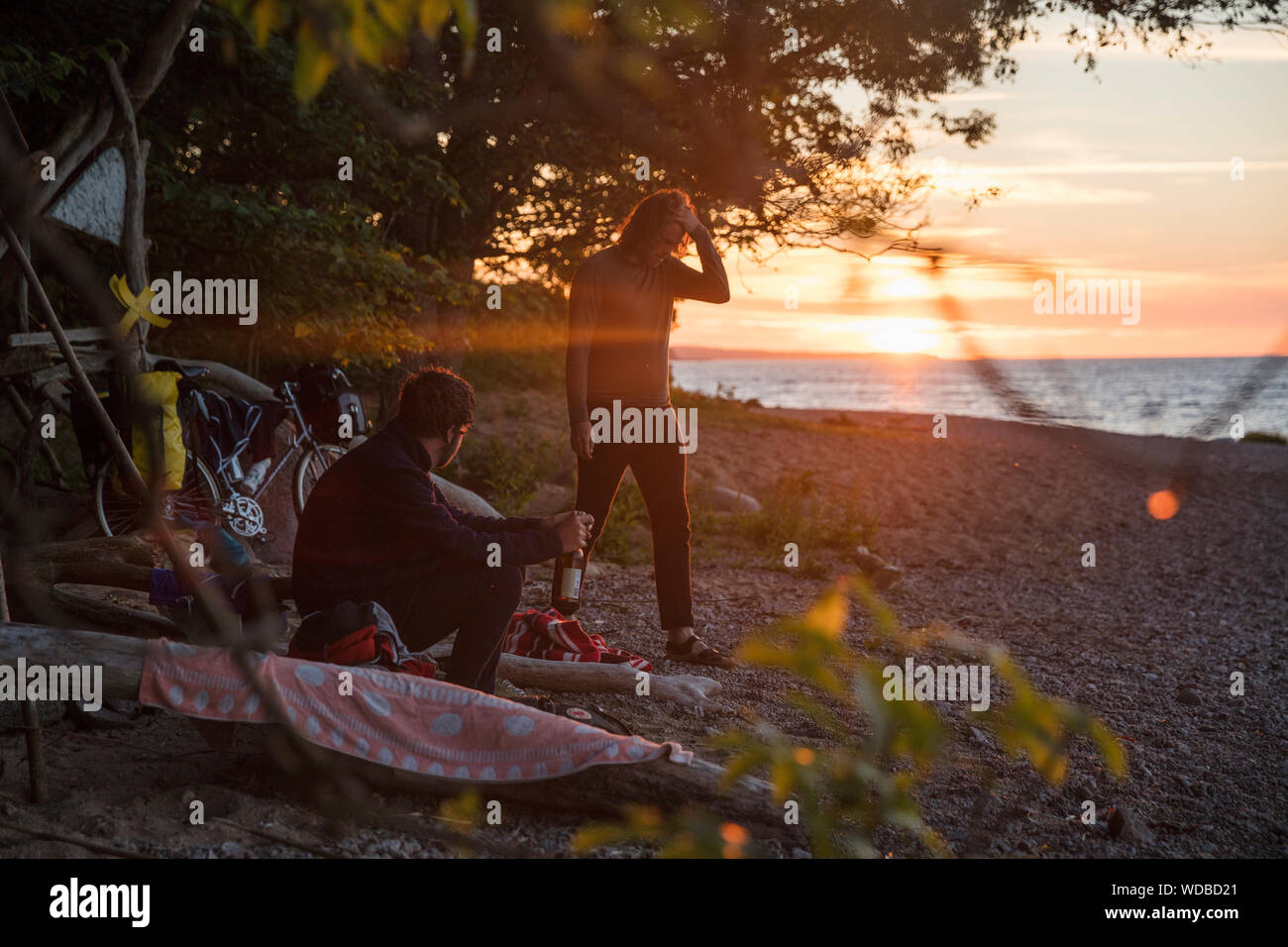 Men at beach hi-res stock photography and images - Alamy