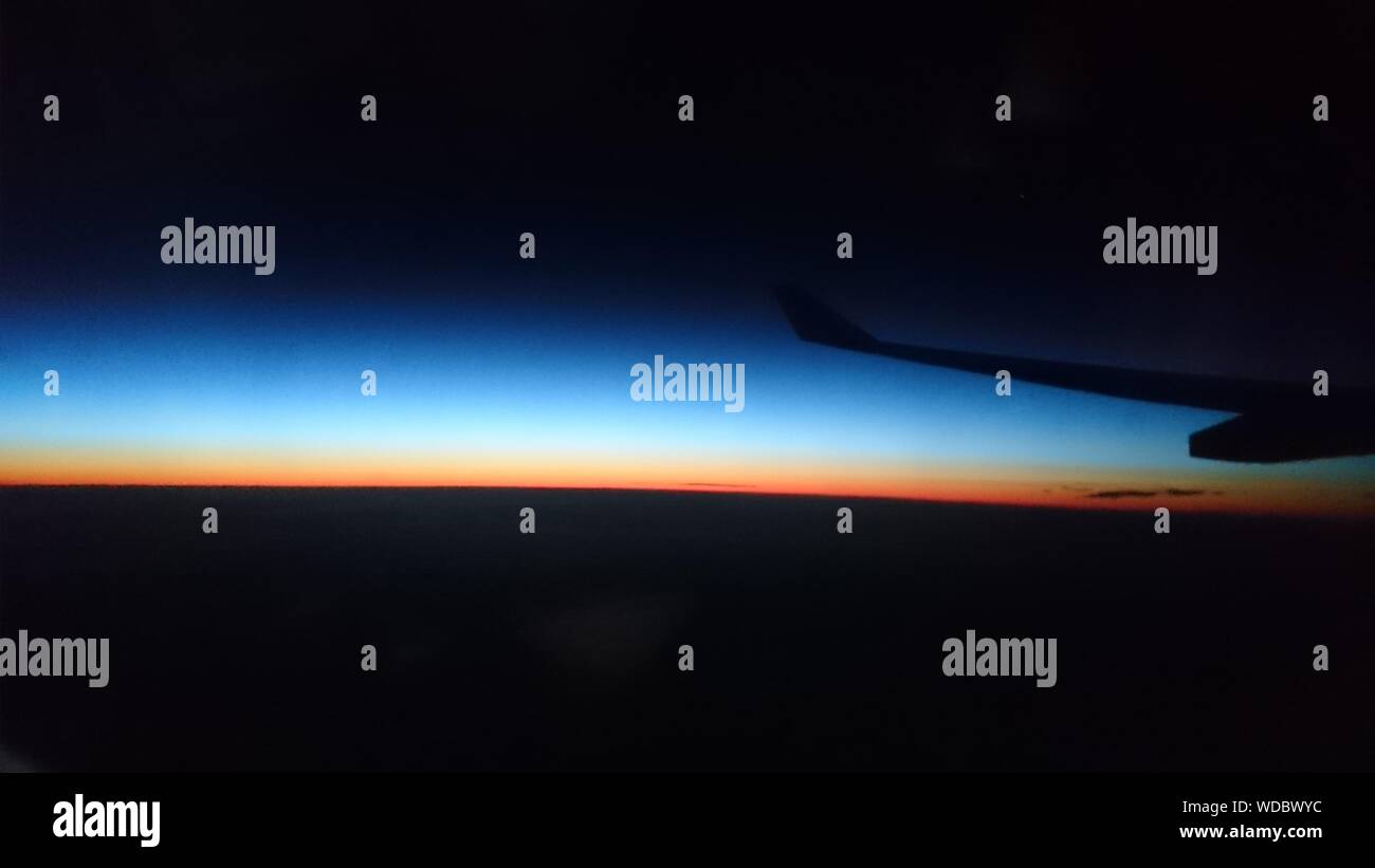 Plane cloud sunset hi-res stock photography and images - Alamy