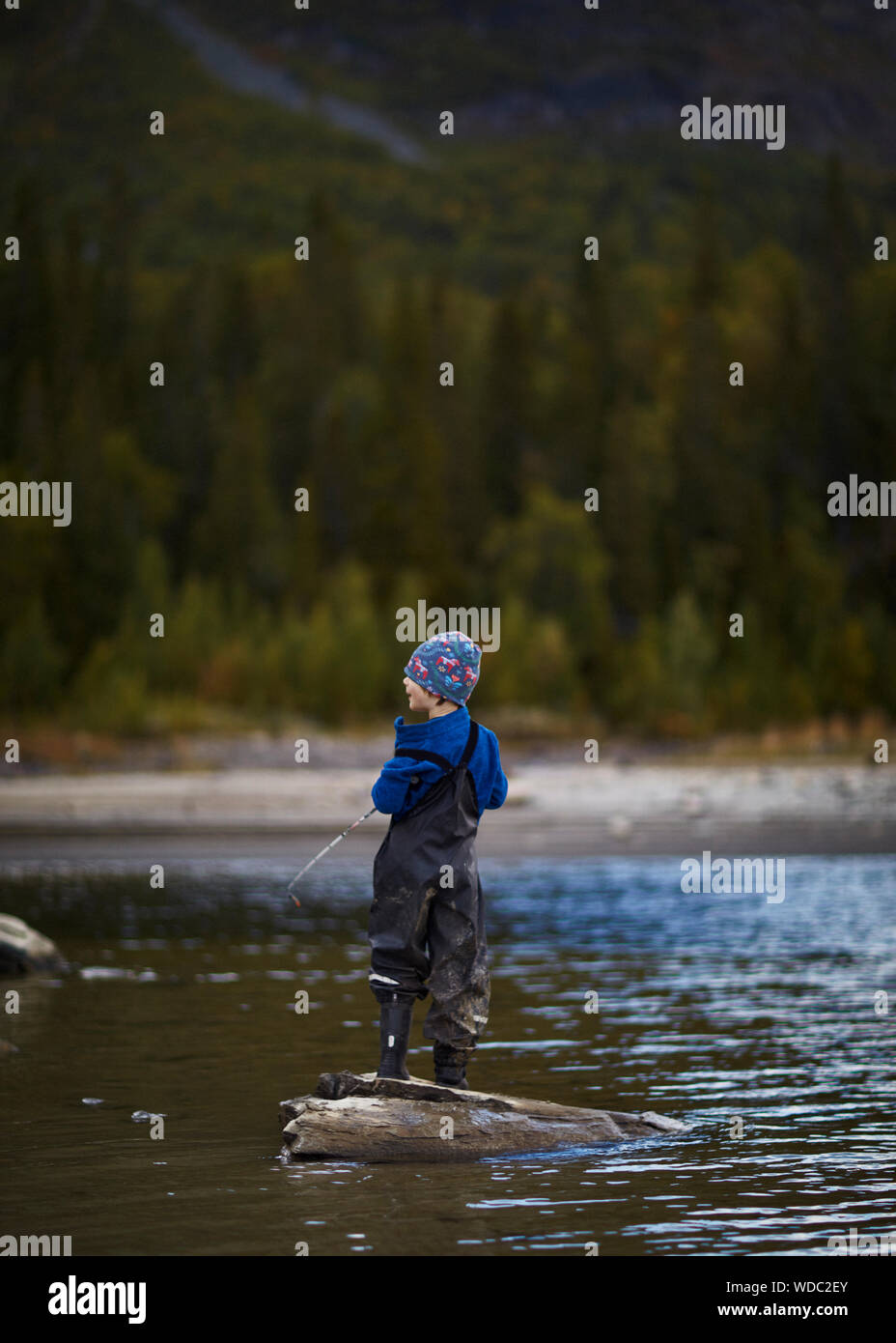Boy Fishing In River High Resolution Stock Photography and Images - Alamy