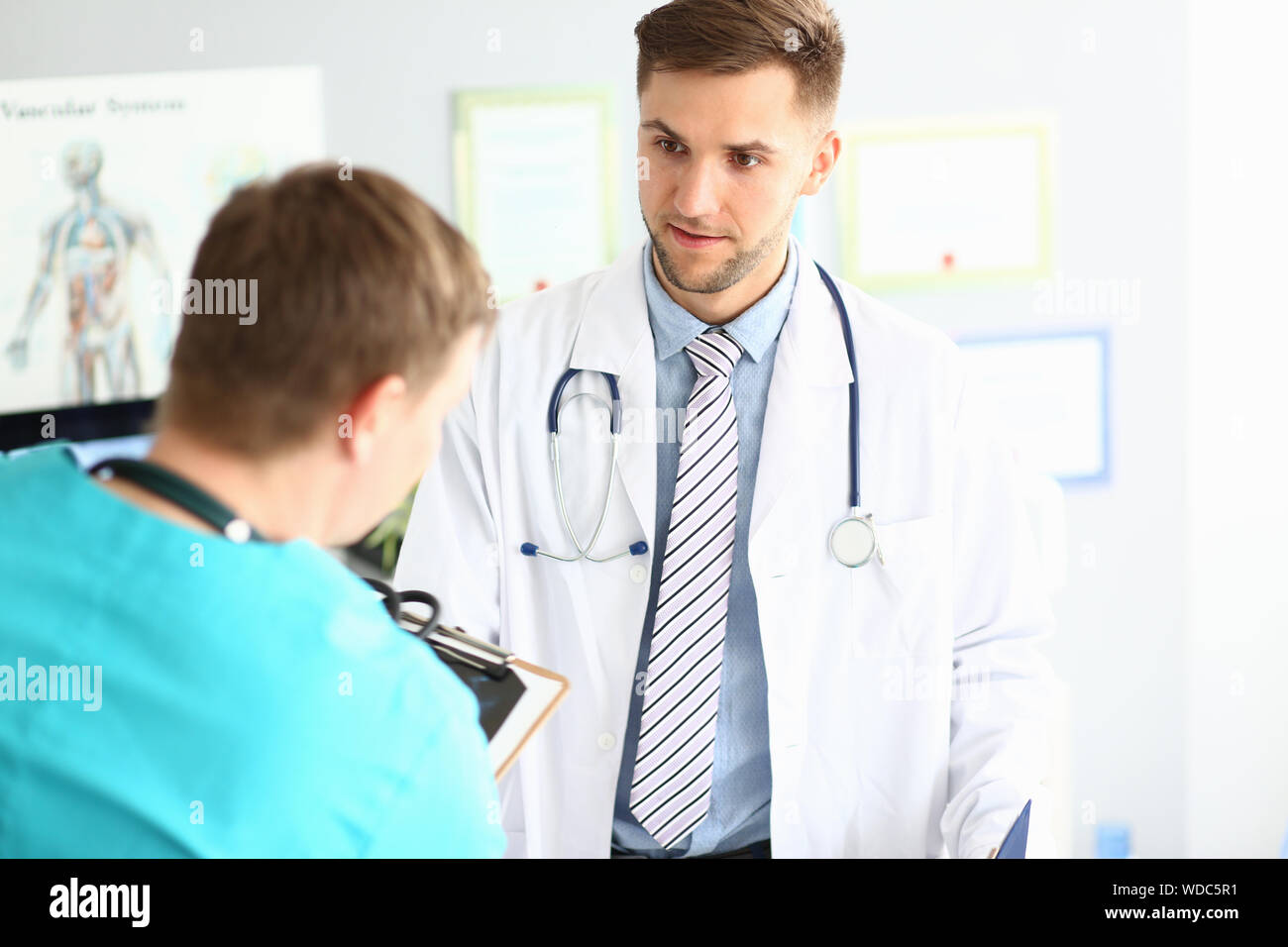 Good Gesture And Colleagues High Resolution Stock Photography and ...