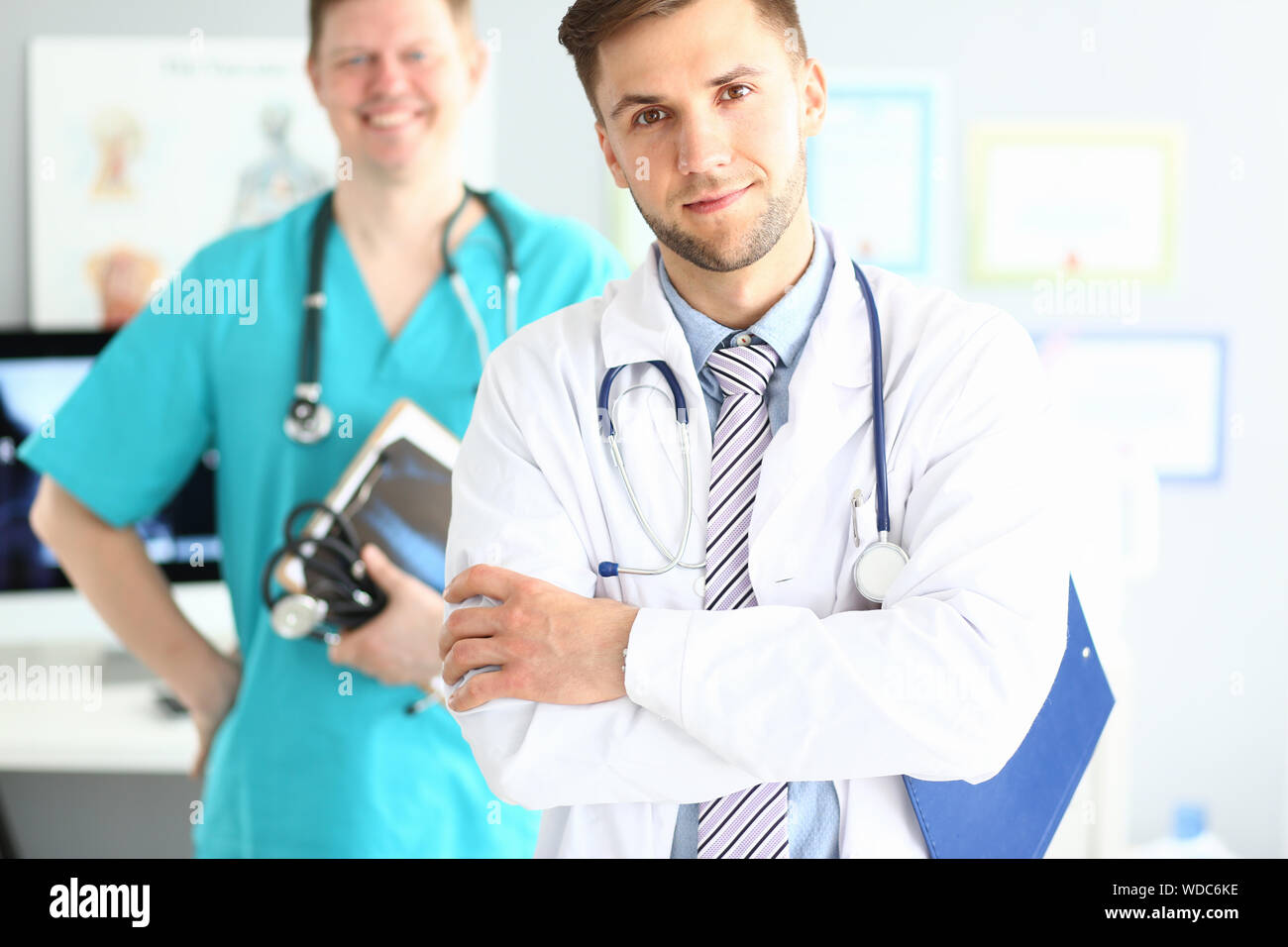 Doctor posing in hospital Stock Photo - Alamy