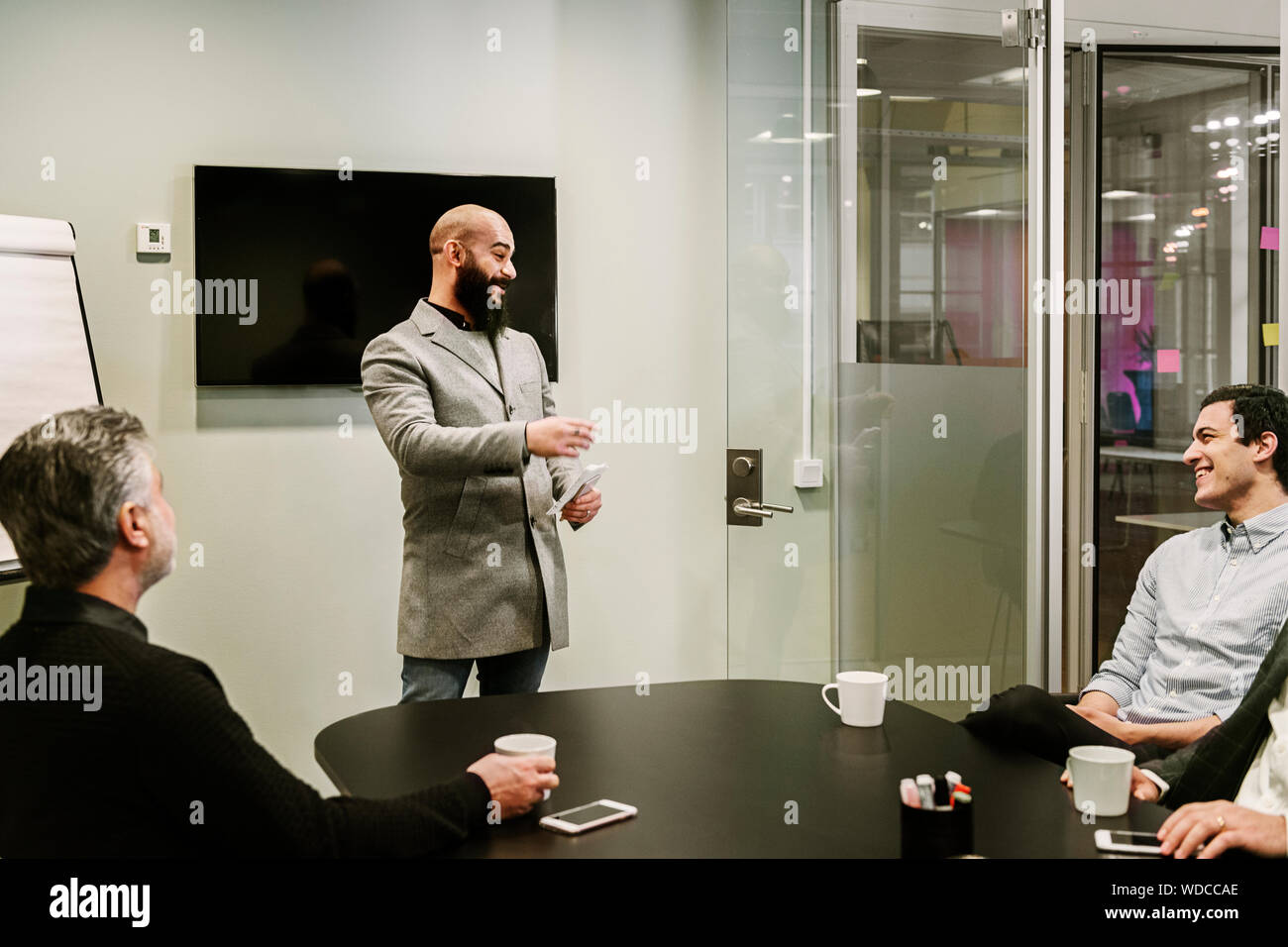 Three men conference hi-res stock photography and images - Alamy