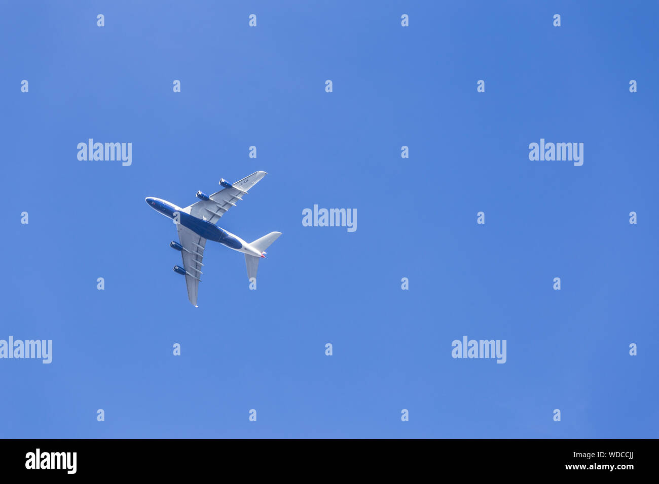 British Airways jet in flight in blue sky Stock Photo - Alamy