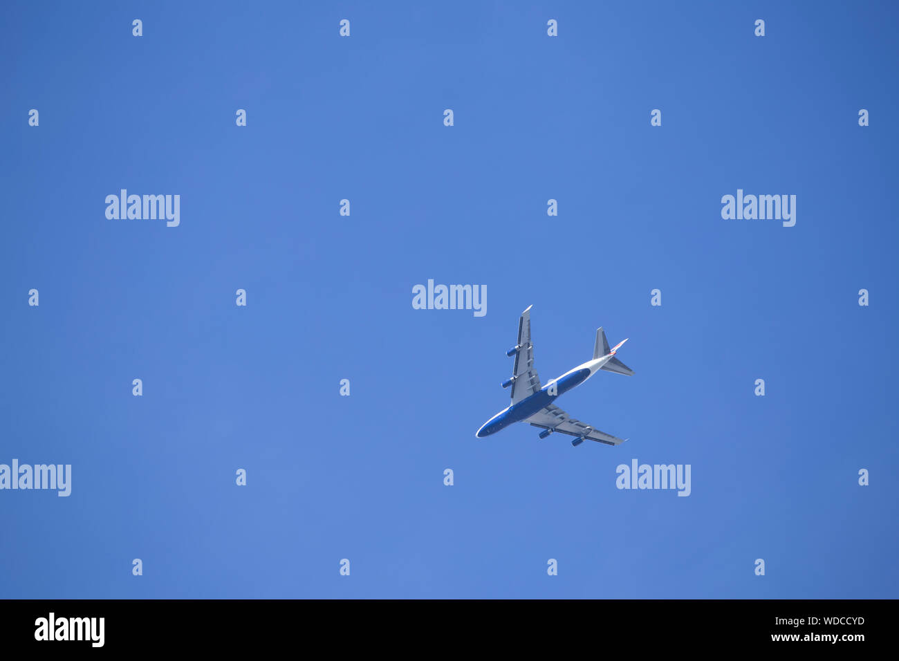 British Airways jet in flight in blue sky Stock Photo - Alamy