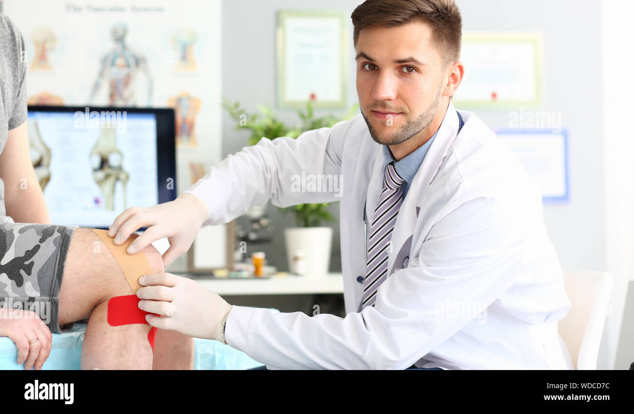 Serious traumatologist at workplace Stock Photo - Alamy