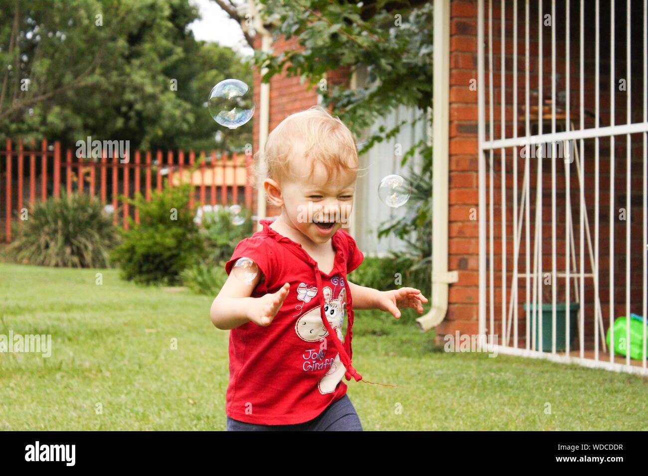 Baby in bubbles hi-res stock photography and images - Alamy