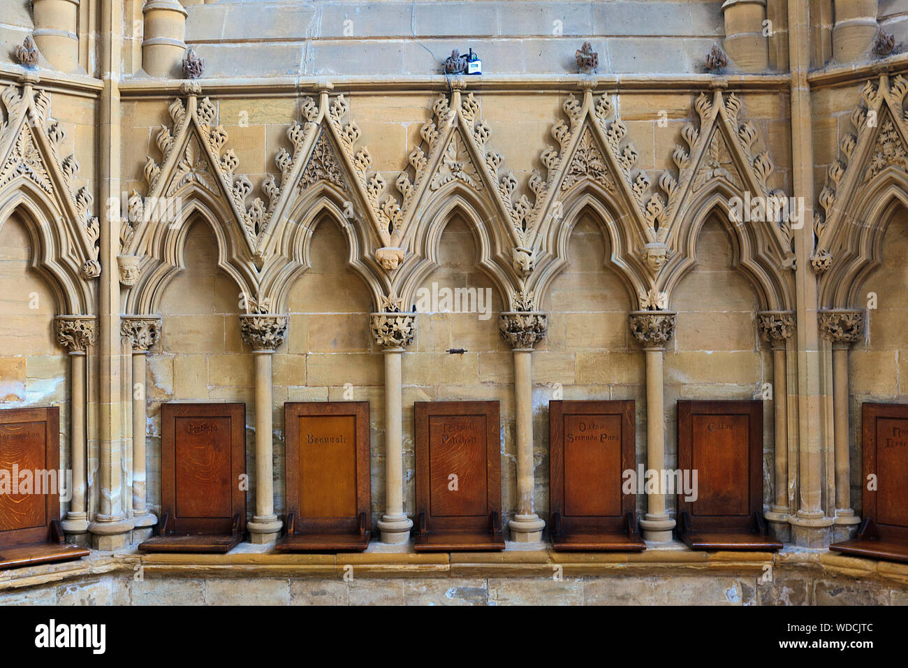 13th century stone carvings around the seats in the Chapter House of ...