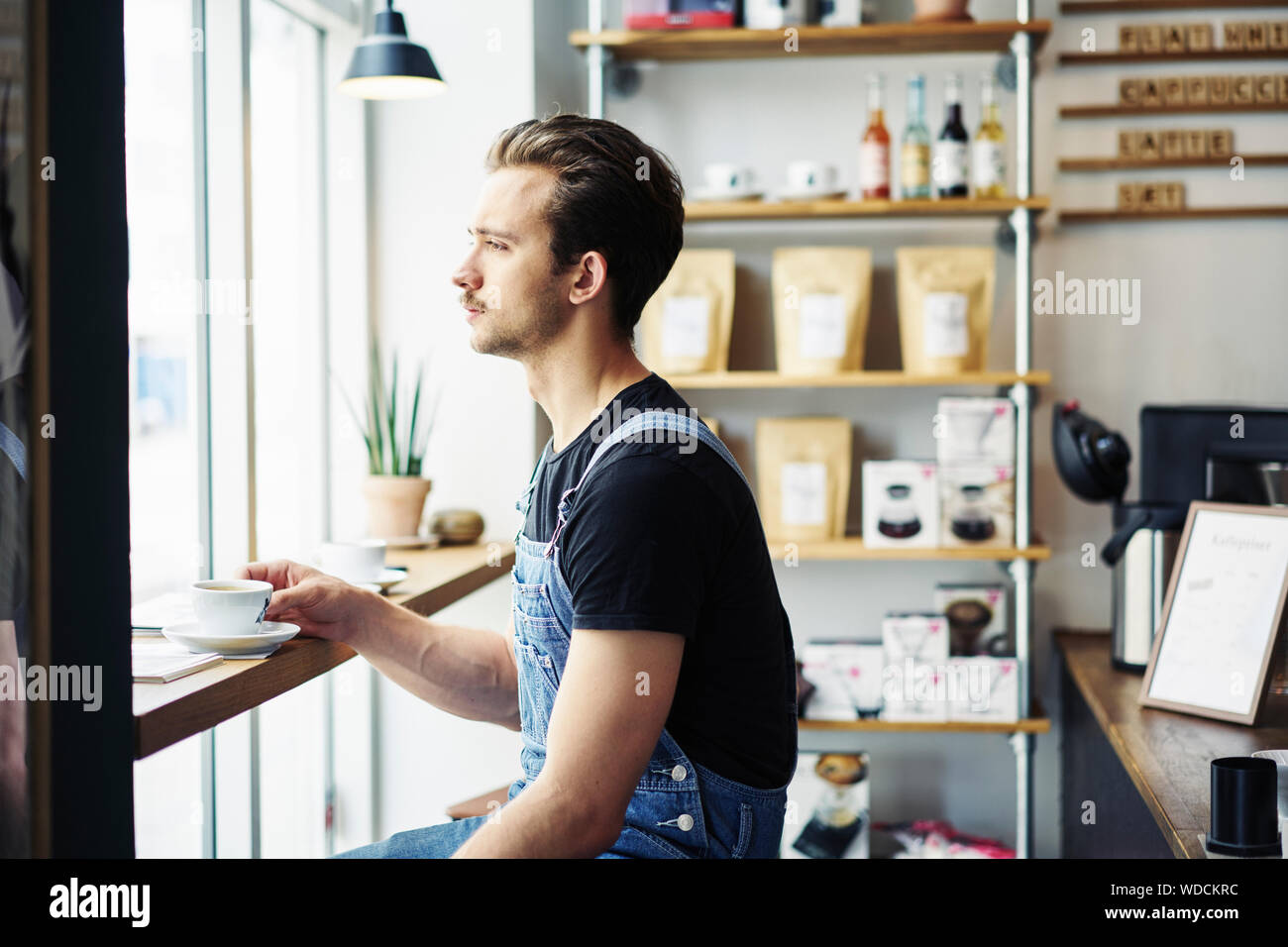 Man in cafe hi-res stock photography and images - Alamy
