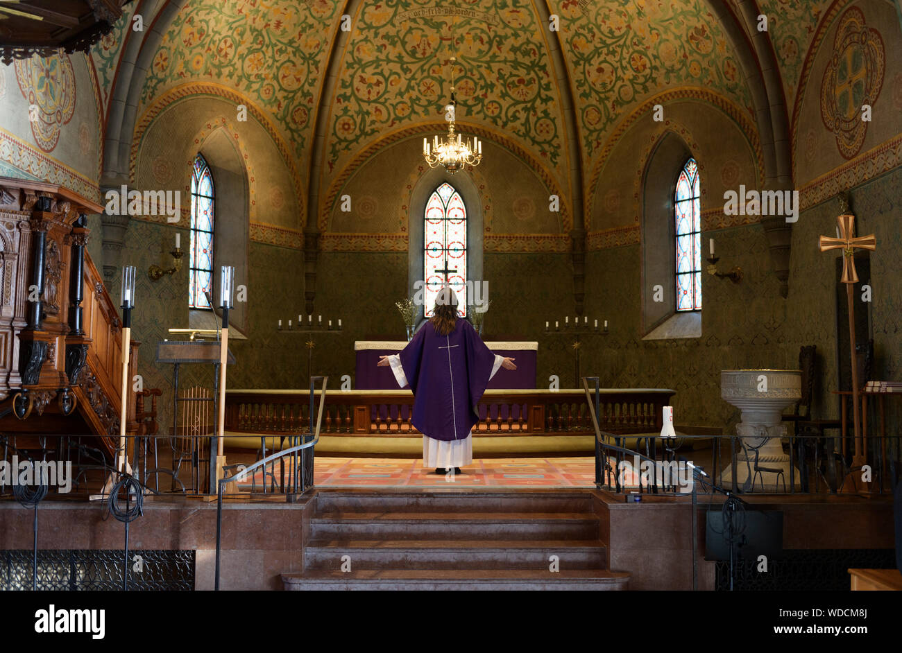 Standing priest hi-res stock photography and images - Alamy