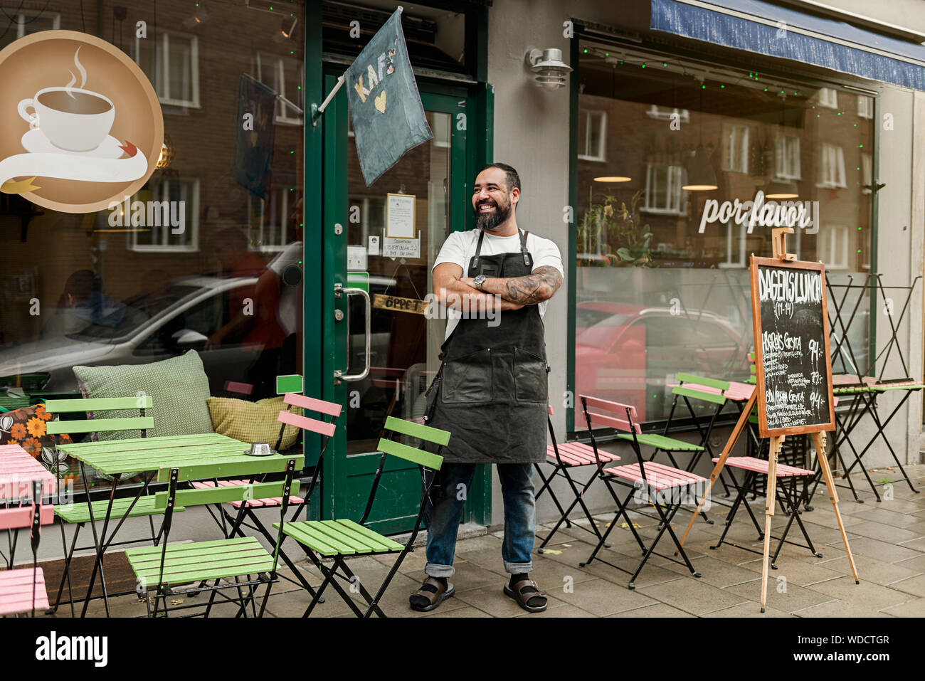 Cafe owner outside cafe hi-res stock photography and images - Alamy