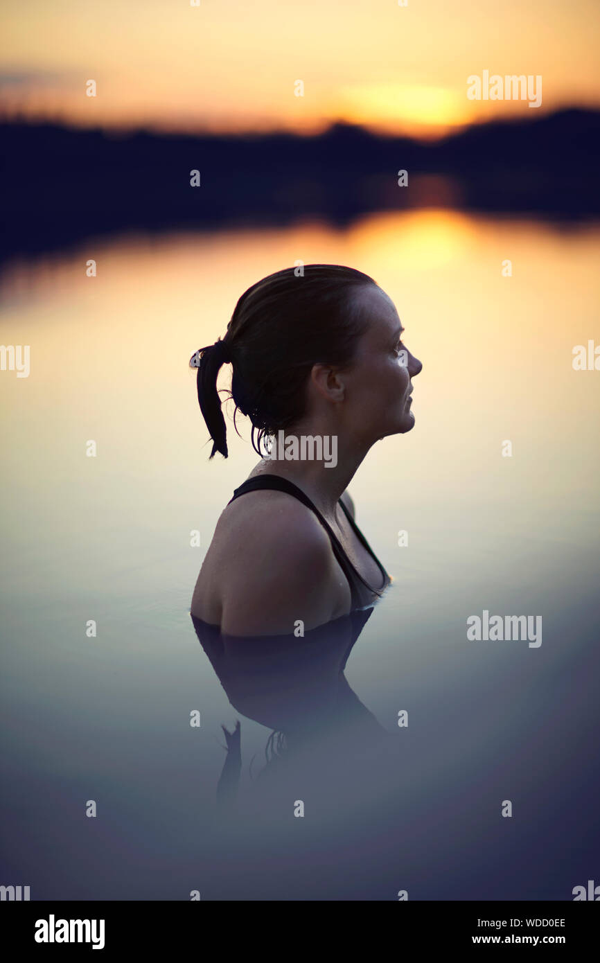 One woman water reflection hi-res stock photography and images - Alamy