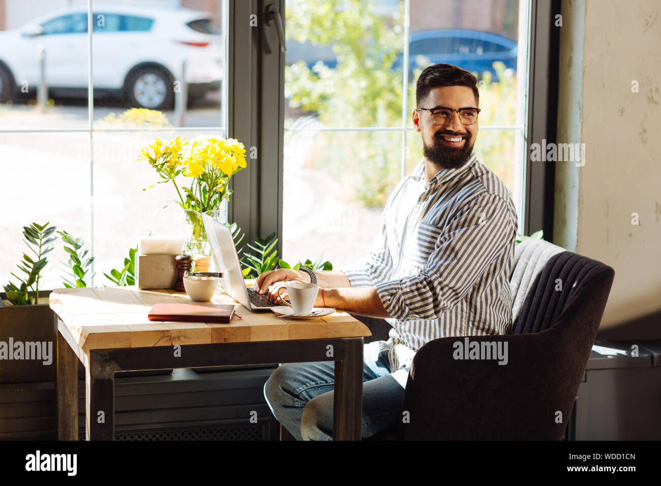 Bearded man working drinking coffee hi-res stock photography and images ...