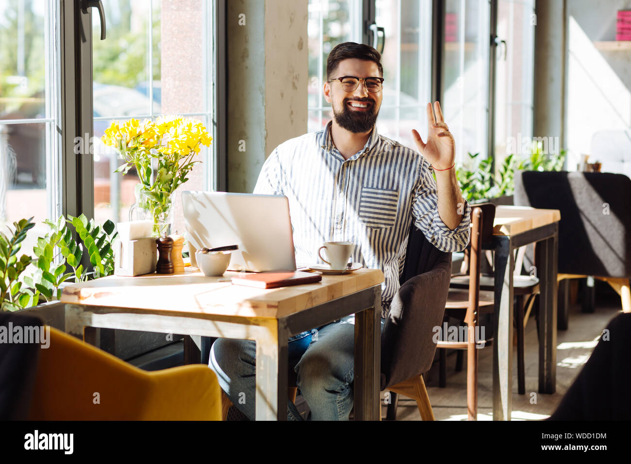 Man calling waiter hi-res stock photography and images - Alamy