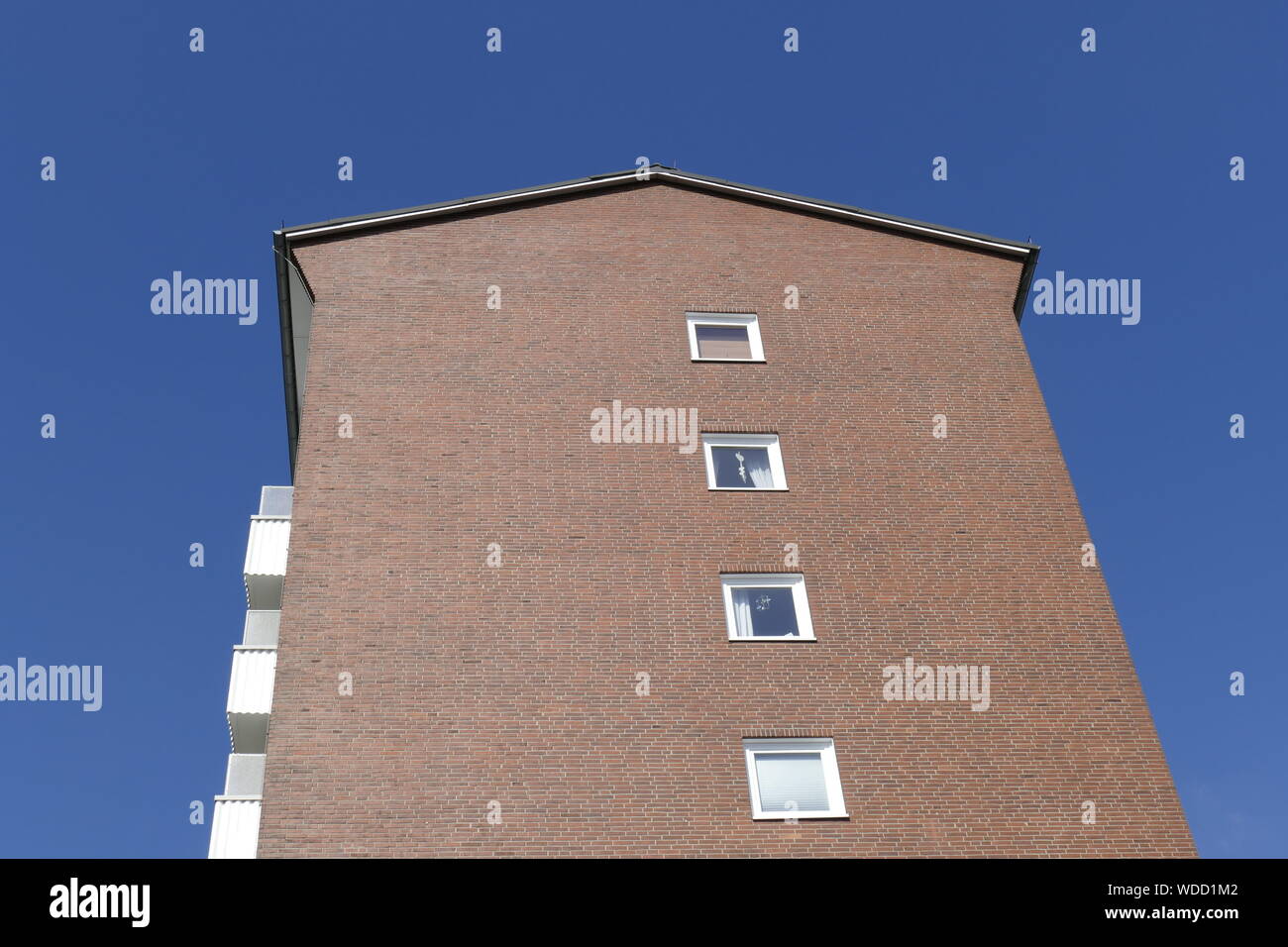 Modern monotone residential building made of brick, side view, Bremen ...