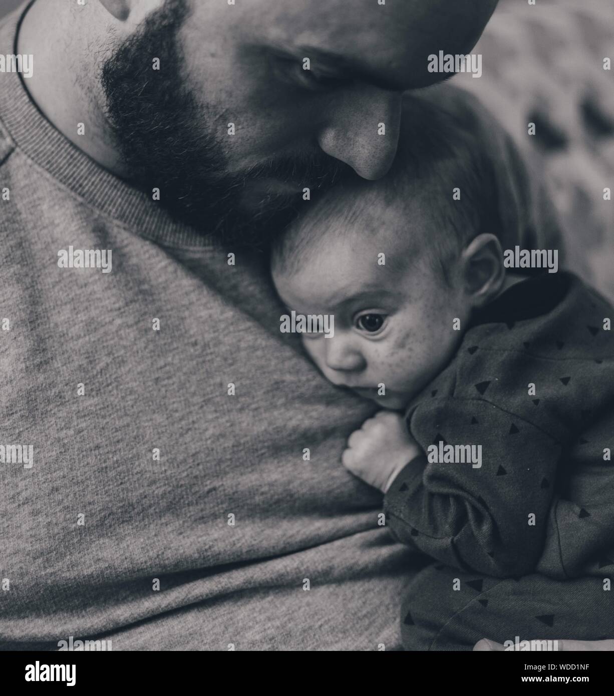 Portrait Of A Father And His Newborn Baby Stock Photo - Alamy
