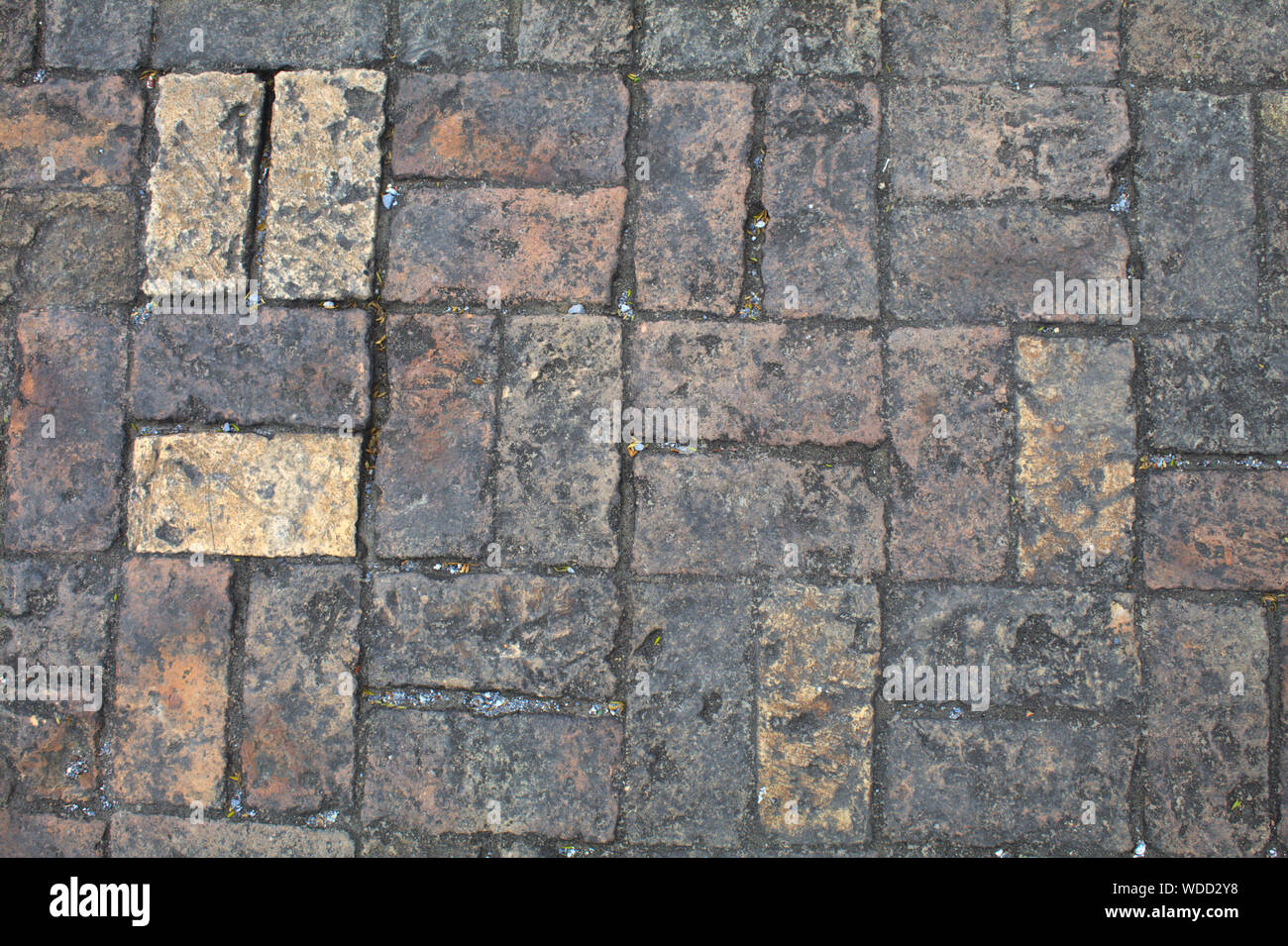 Rocks background in various golden to black tones, in rectangular ...