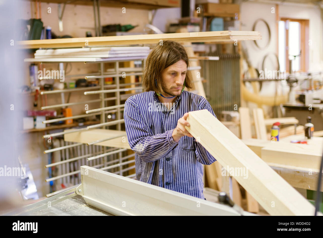 Holding timber hi-res stock photography and images - Alamy