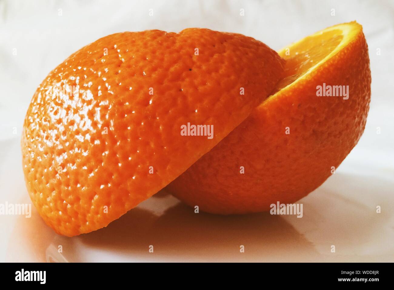 Close up of the cross section of an orange hi-res stock photography and ...