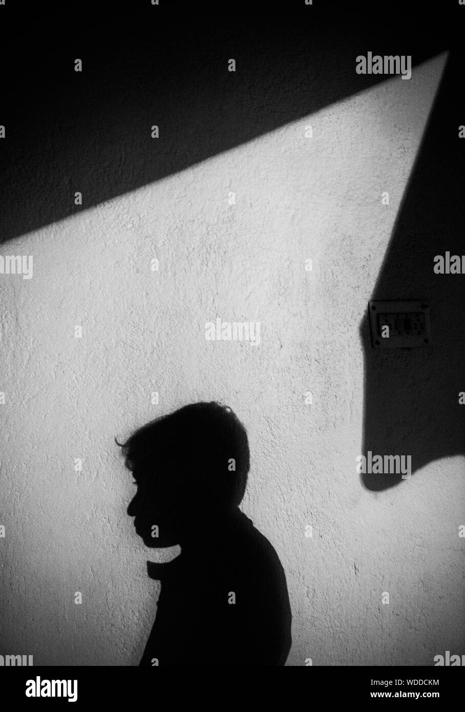 Boy shadow on wall hi-res stock photography and images - Alamy