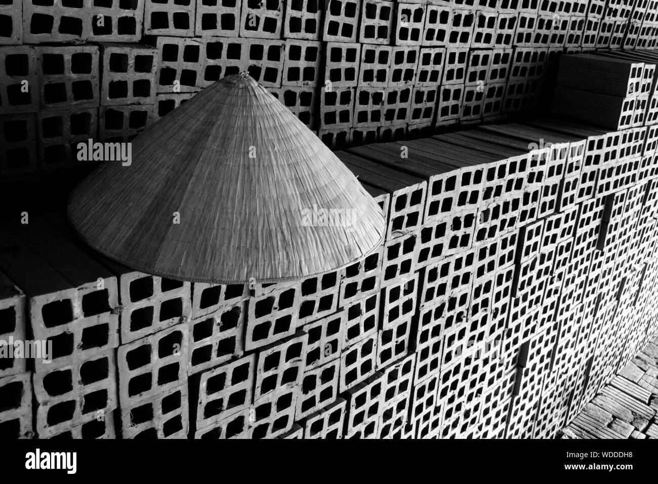 Hat On Stack Of Bricks Stock Photo - Alamy