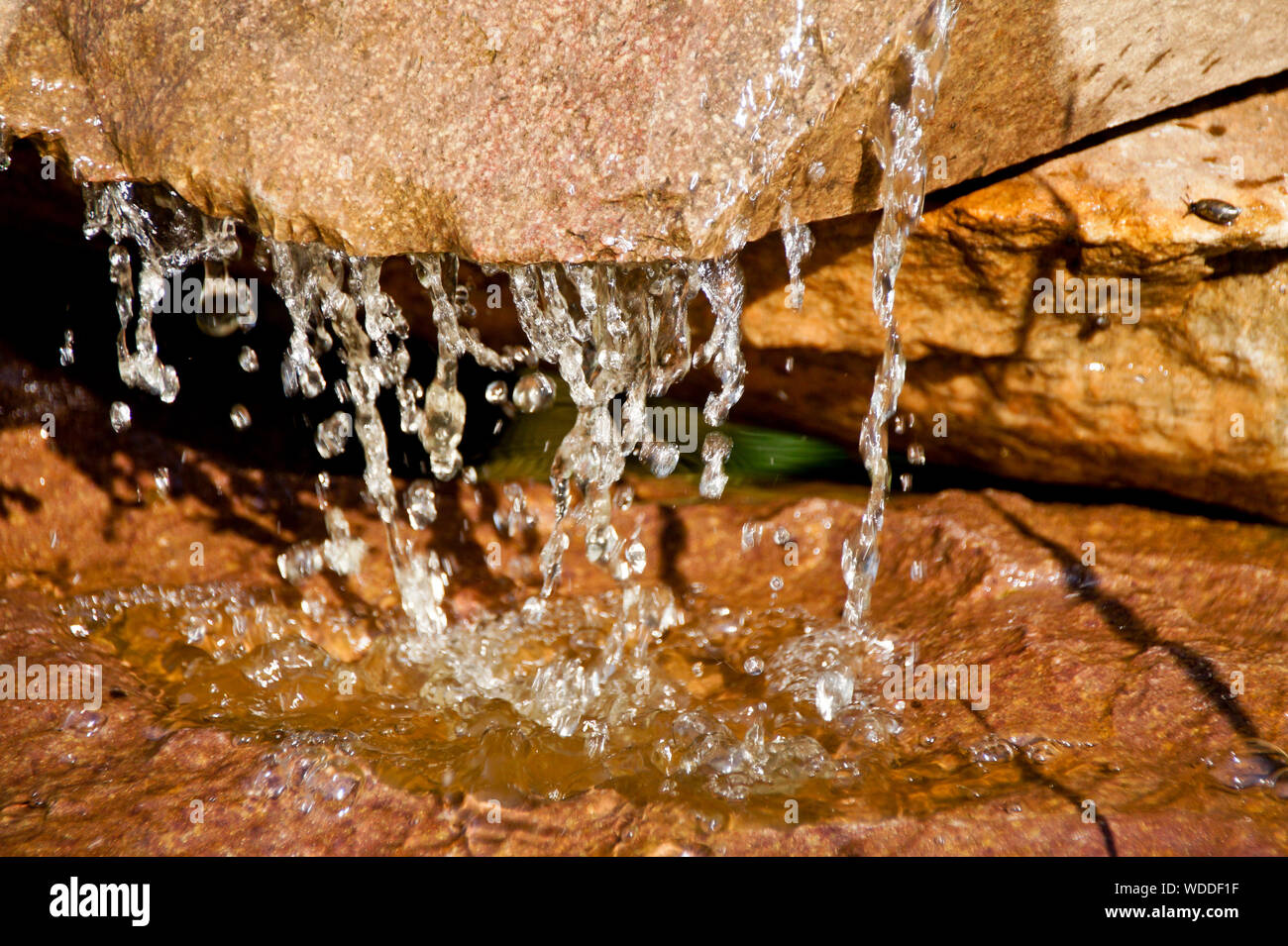 Water falling stone hi-res stock photography and images - Alamy