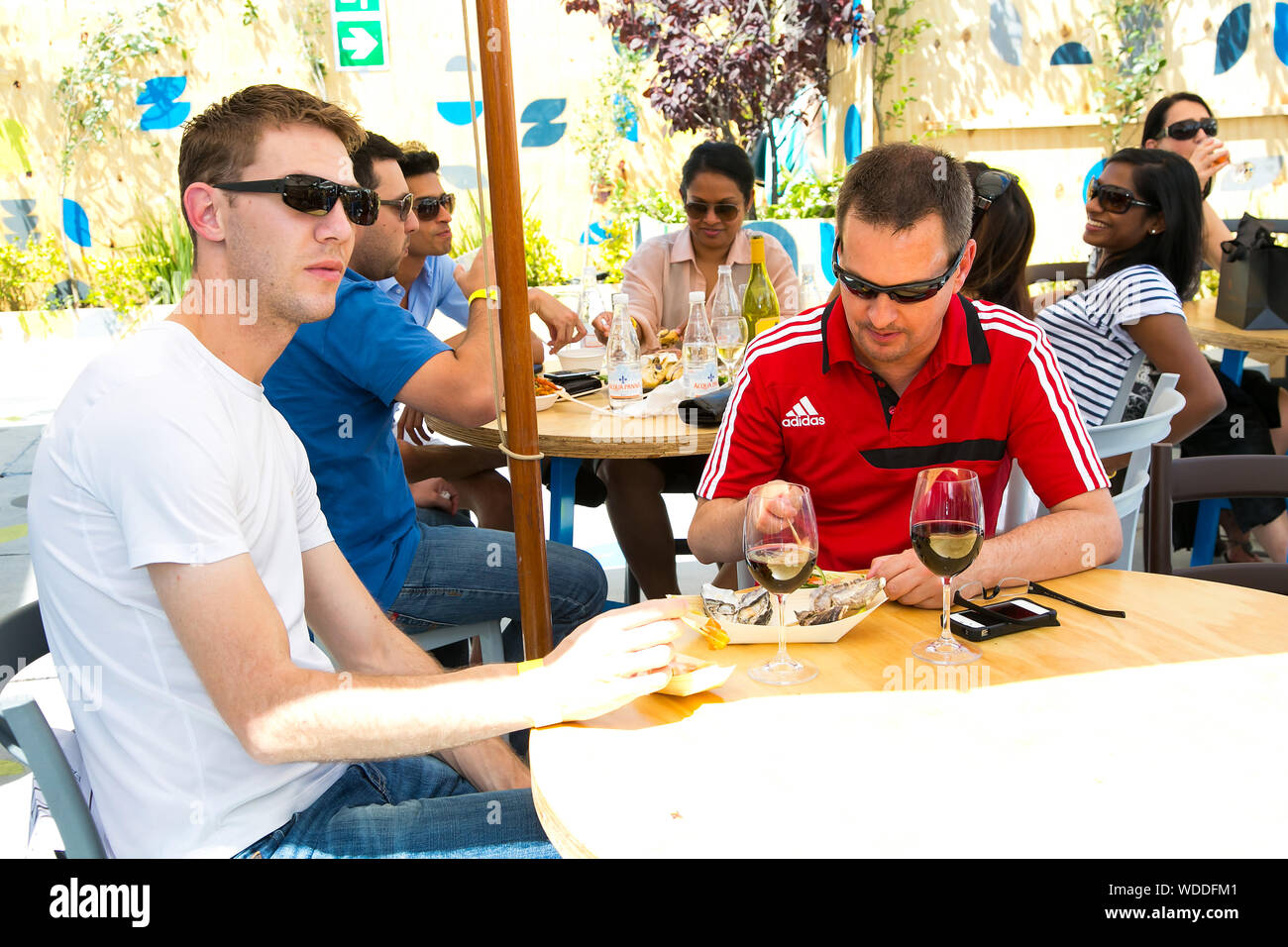 Johannesburg, South Africa - November 9 2013: Male Friends drinking and ...