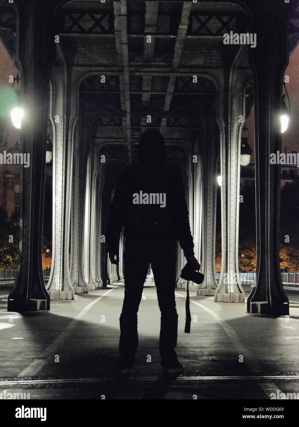 Silhouette Man Standing Bridge High Resolution Stock Photography and ...