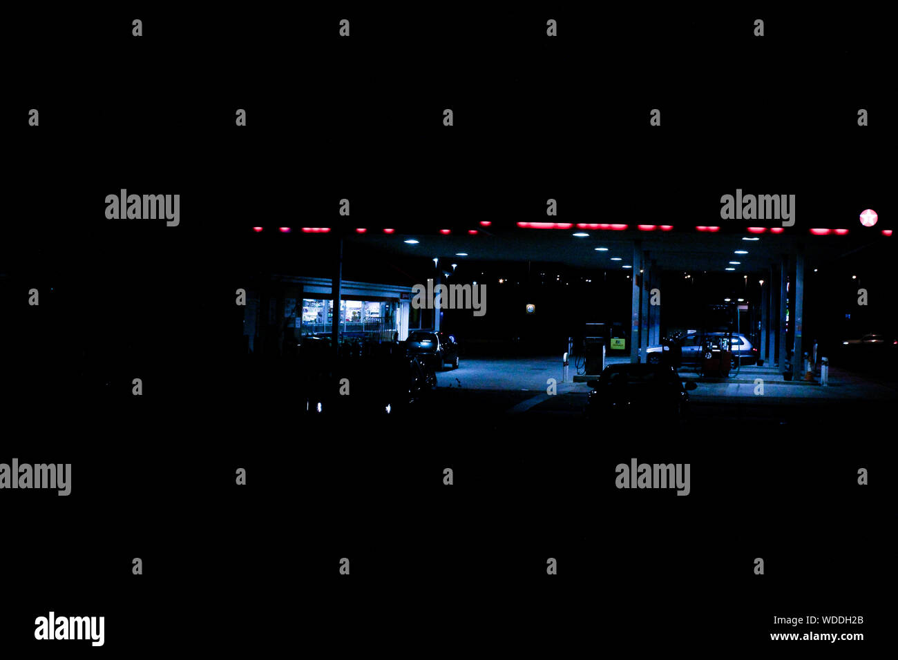 Gas station night people hi-res stock photography and images - Alamy