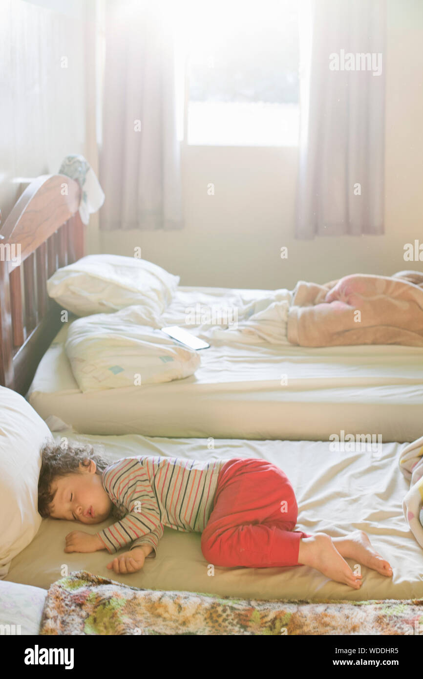 Boy sleeping bed hi-res stock photography and images - Alamy