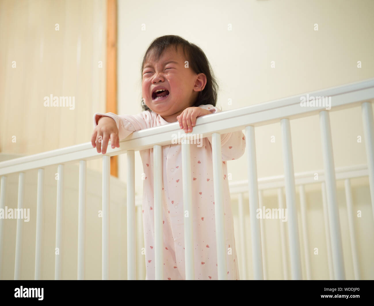 Girl crying bedroom hi-res stock photography and images - Alamy
