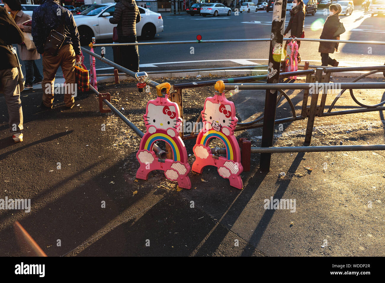 Hello Kitty figures used on the pavement to designate an under ...