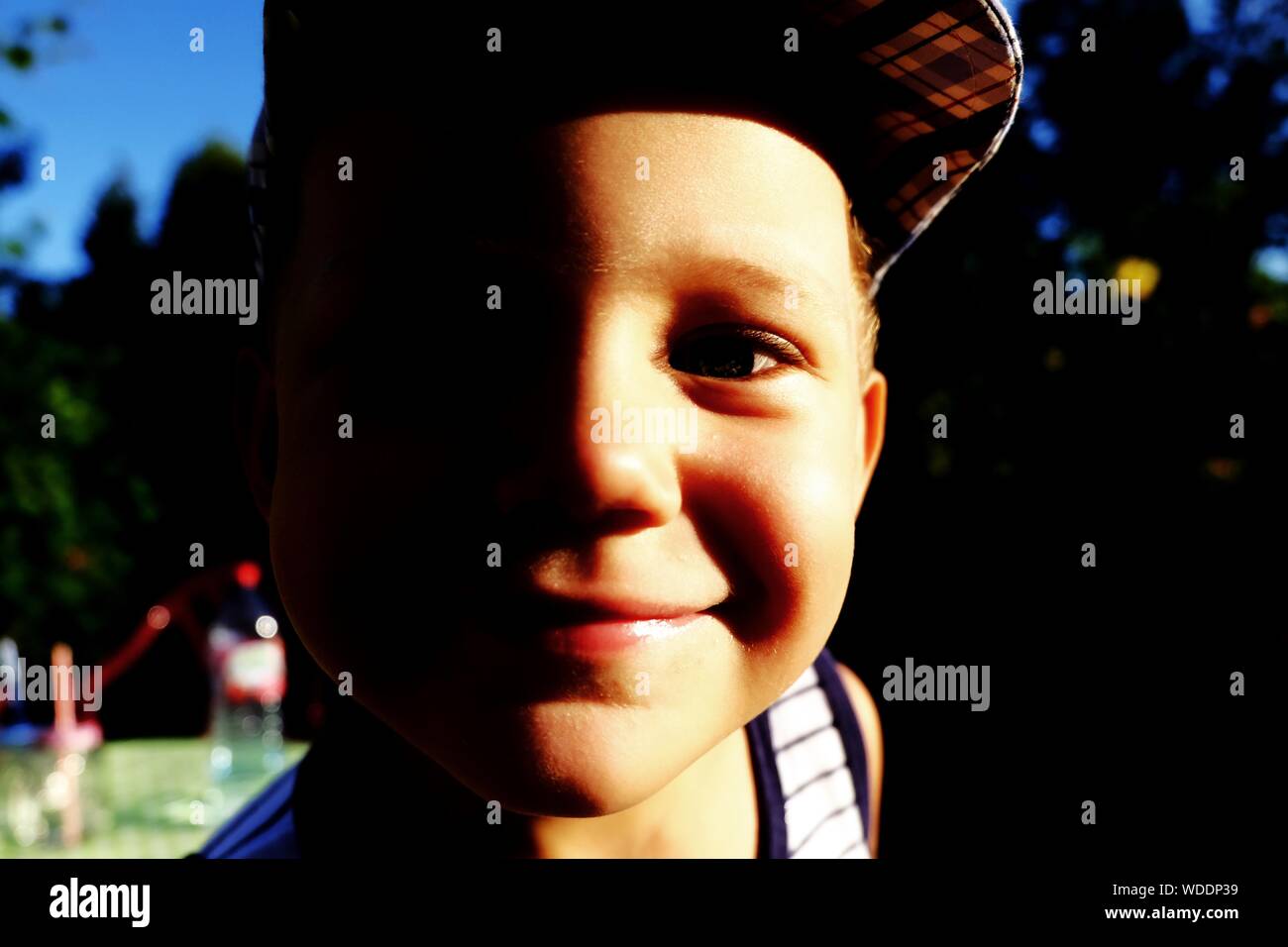 Man in shadow smiling hi-res stock photography and images - Alamy