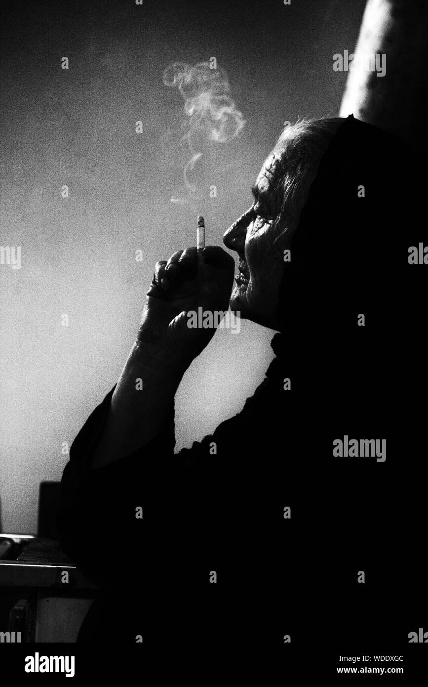 Indian woman smoke Black and White Stock Photos & Images - Alamy