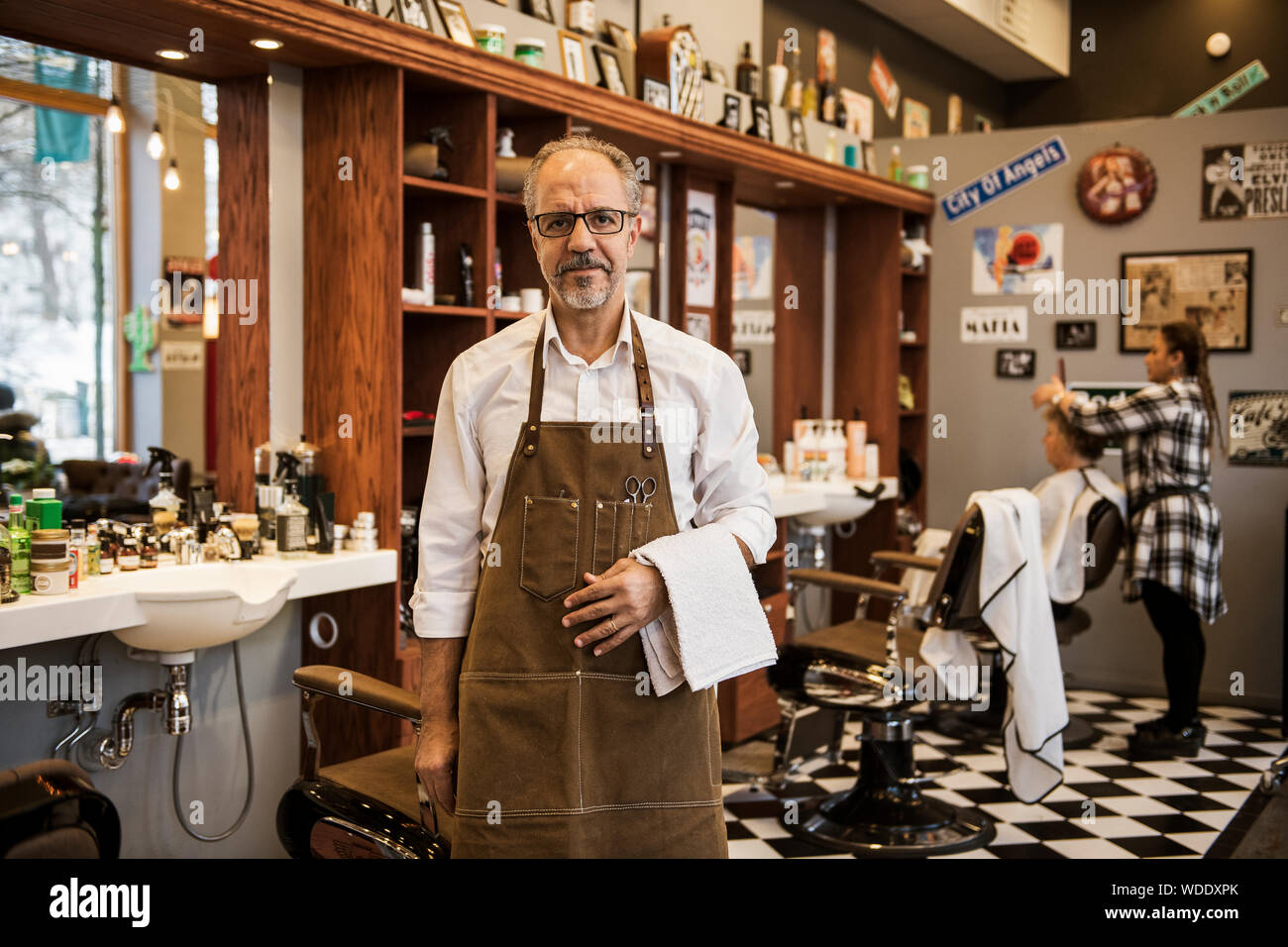 Barber in front barbershop in hi-res stock photography and images - Alamy